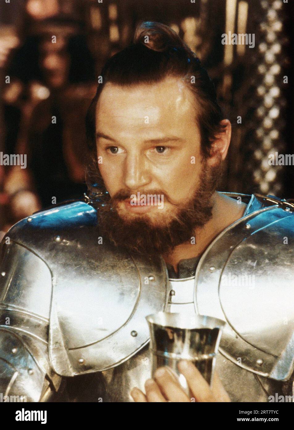Liam Neeson, "Excalibur" (1981). Photo credit: Warner Bros. (File ...