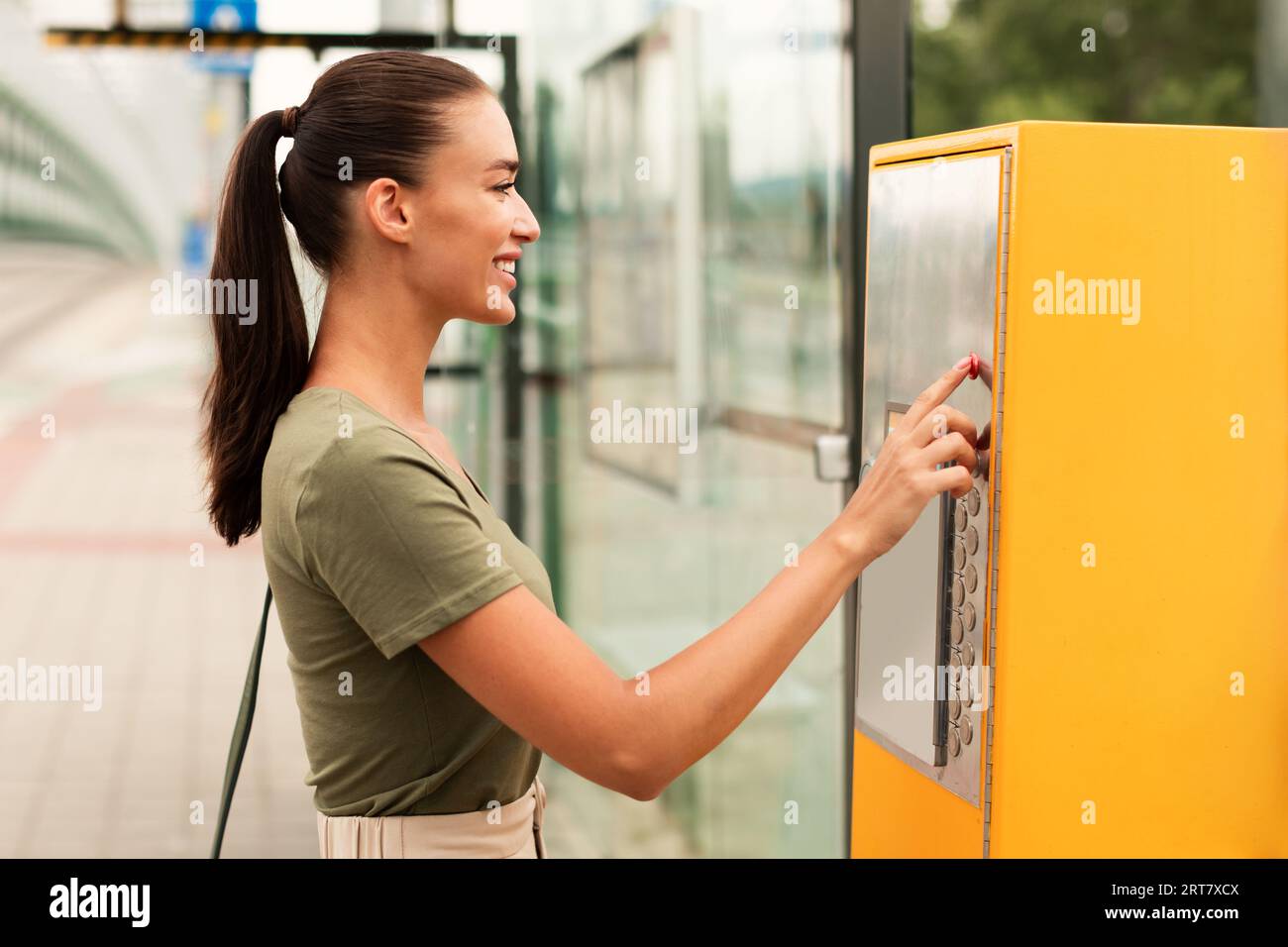 Happy Passenger Woman Buying Tram Tickets Via Vending Machine Outdoors ...