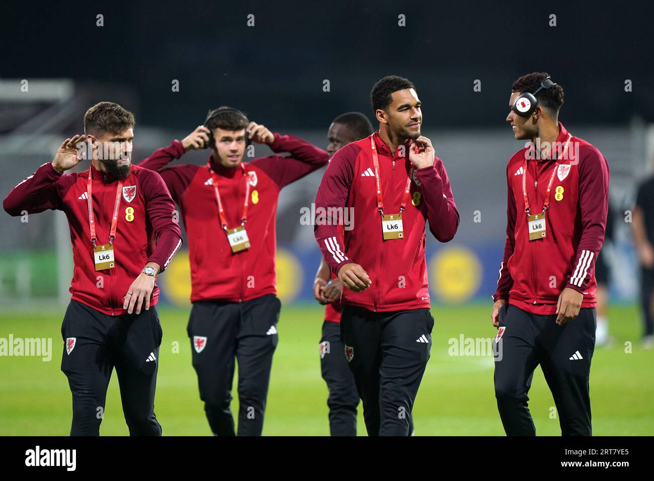 Wales players walk on the pitch before the UEFA Euro 2024 Qualifying Group D match at the Skonto ...