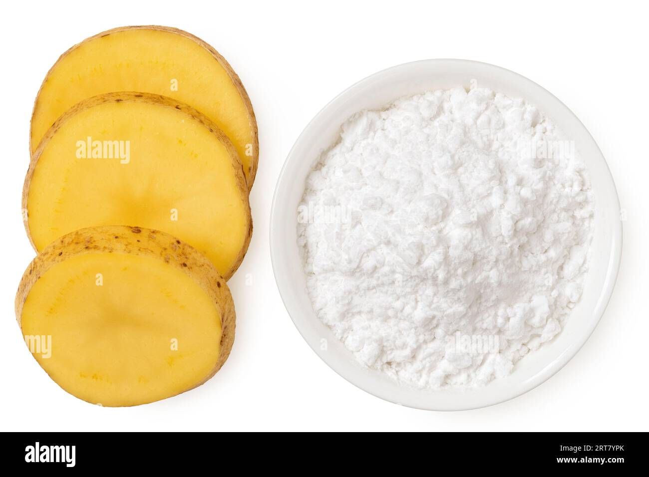 Potato starch in a white ceramic bowl next to slices of raw potato with ...