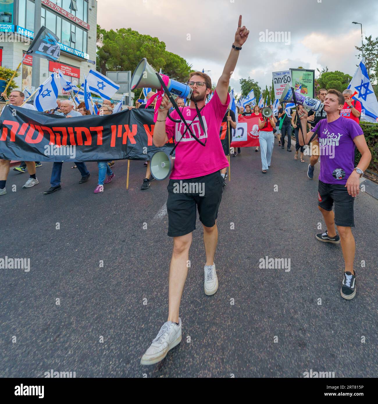 Haifa, Israel - September 09, 2023: People march with various signs and ...