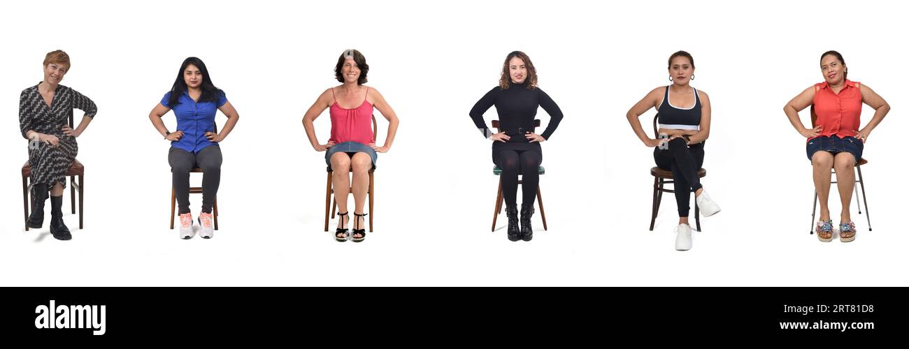 group of women sitting on chiar with arms akimbo on white background ...