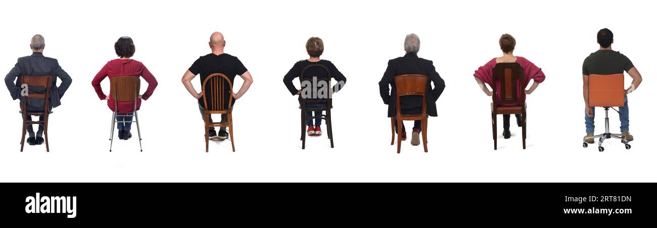 group of woman and man sitting on chair with arms akimbo on white ...