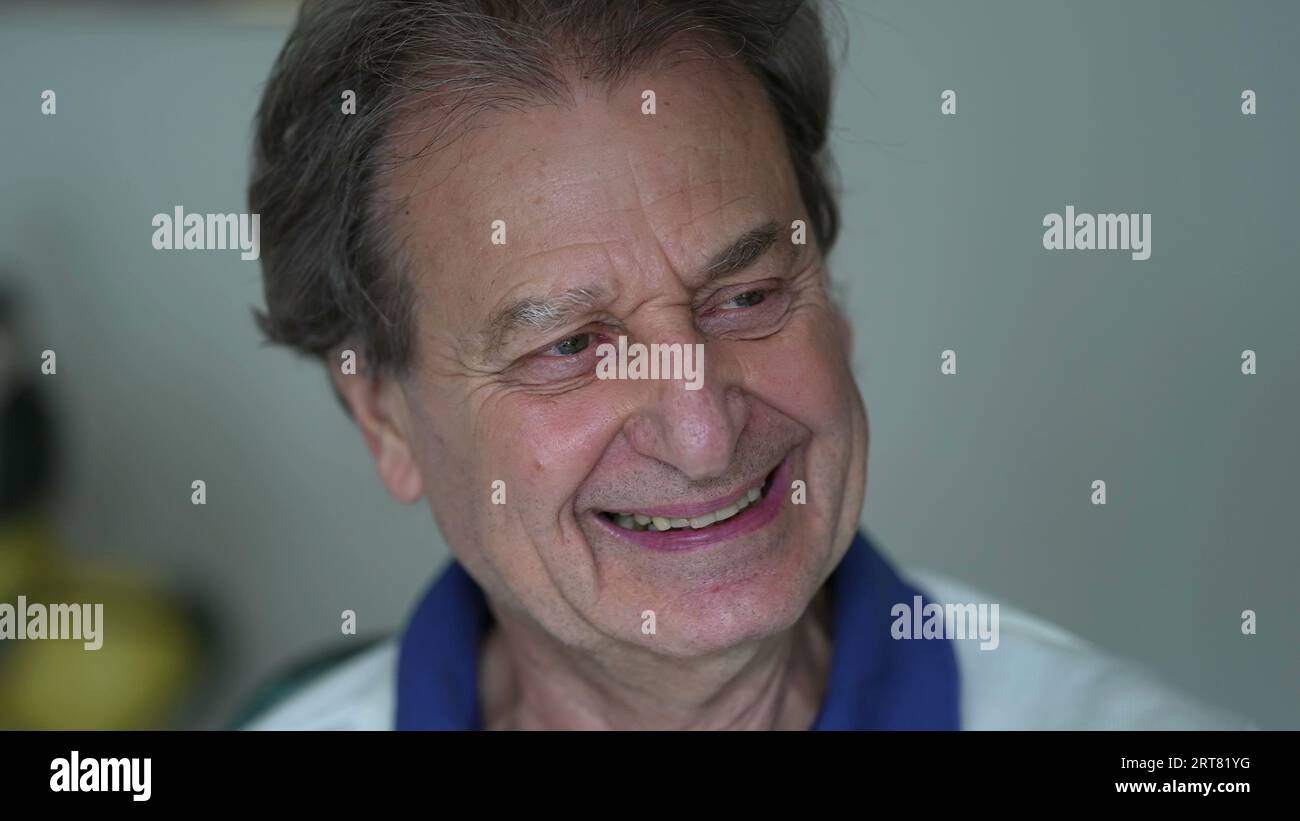 Happy senior man laughing and smiling, close-up face of retired elderly ...