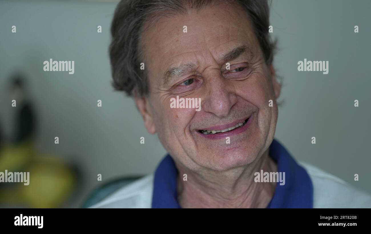 Happy senior man laughing and smiling, close-up face of retired elderly ...
