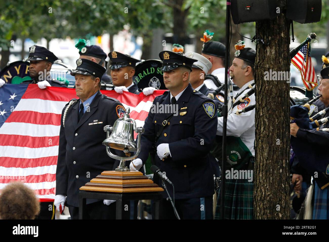 New York, United States. 11th Sep, 2023. A bell is rung by a Port ...