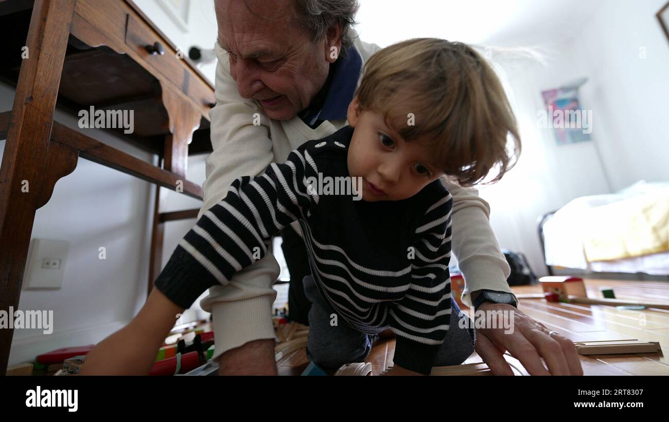 Grandfather and Grandson Sharing Playful Moments together with Classic ...