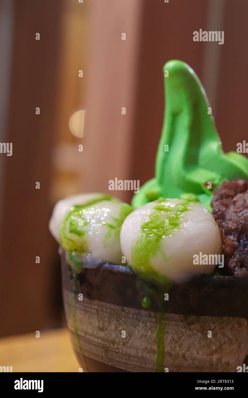 A Matcha Flavored Ice Cream with Red Beans and Glutinous Rice Balls on ...