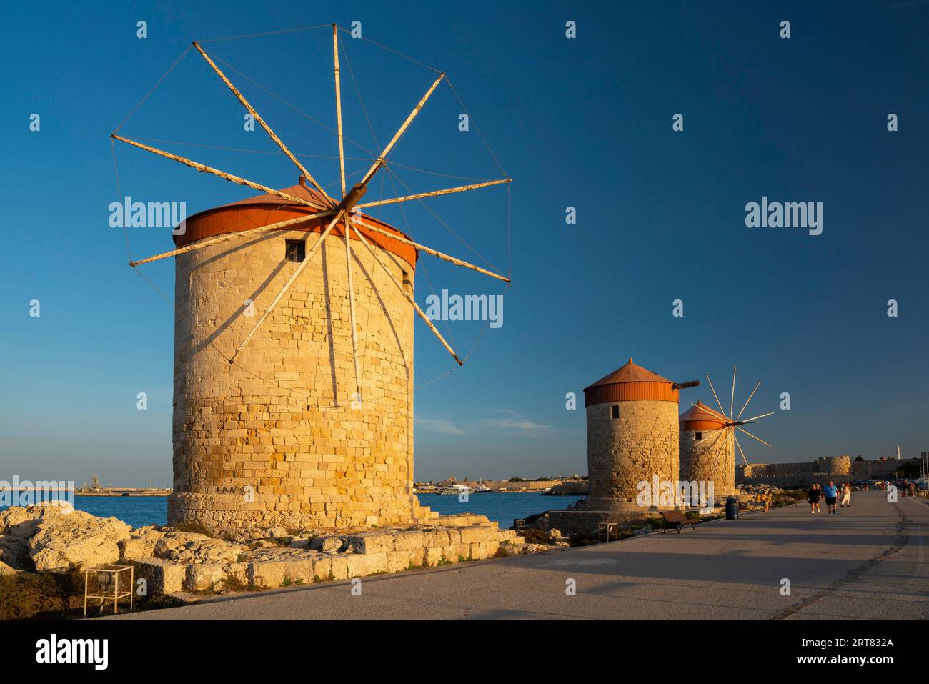 View of Rhodes Windmills at sunset, Old Rhodes Town, Rhodes, Dodecanese ...