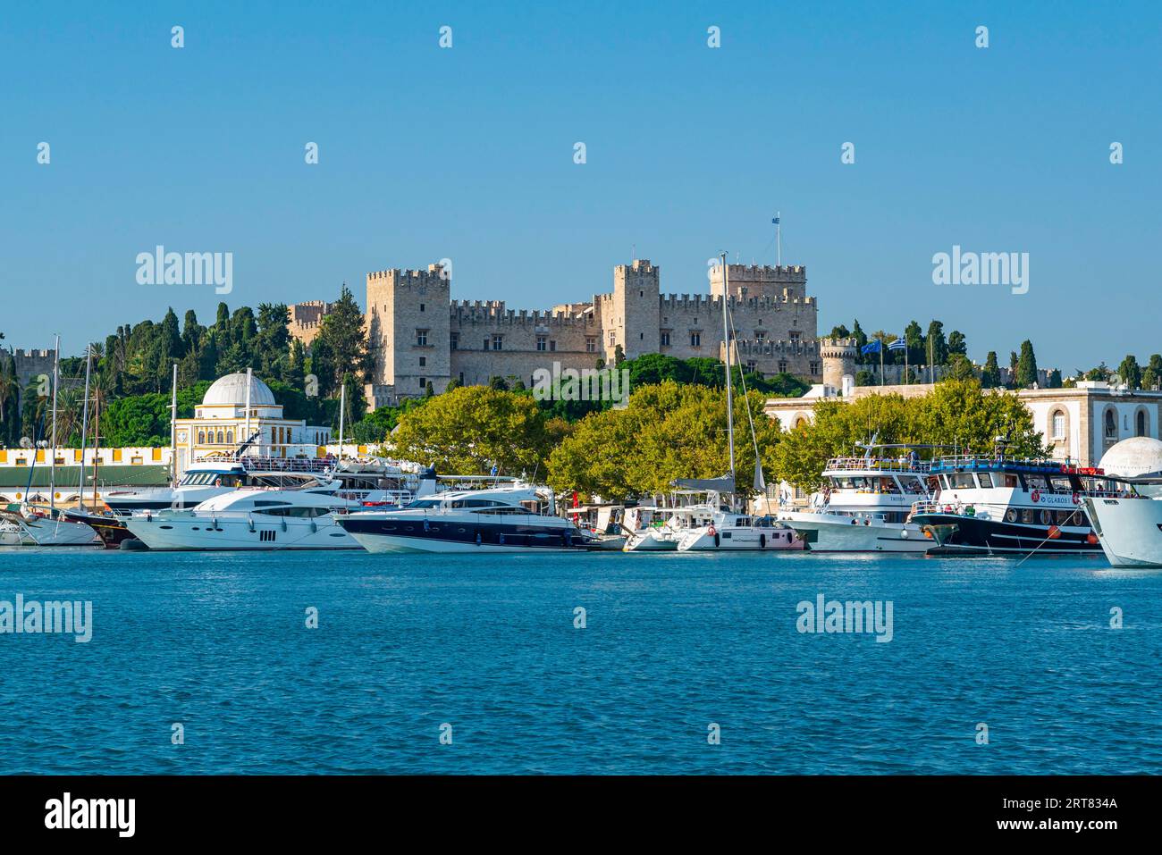 The New Market at Mandraki Harbour, Grand Master's Palace in the back ...