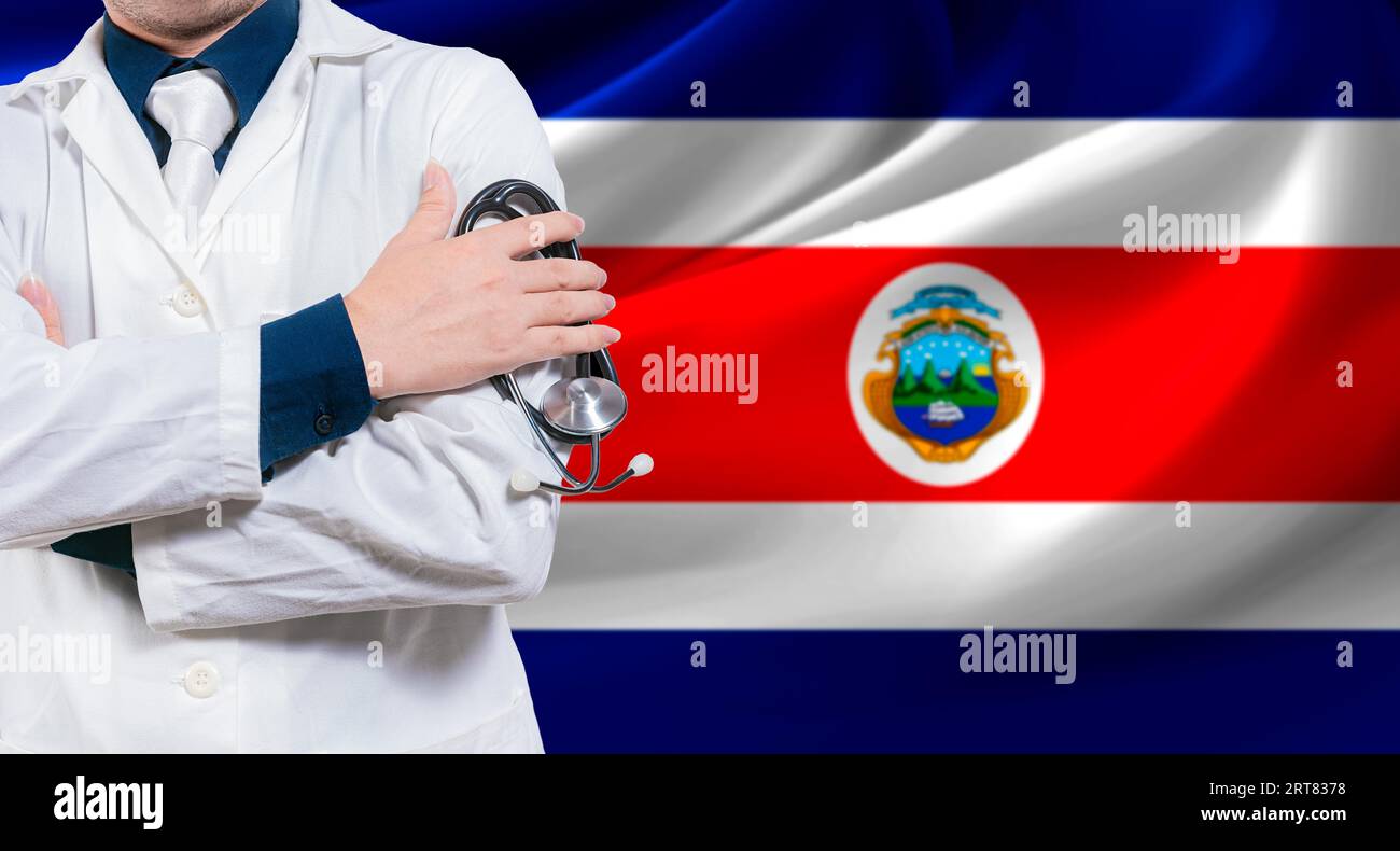 Doctor with stethoscope on Costa Rica flag. Costa Rica national health ...