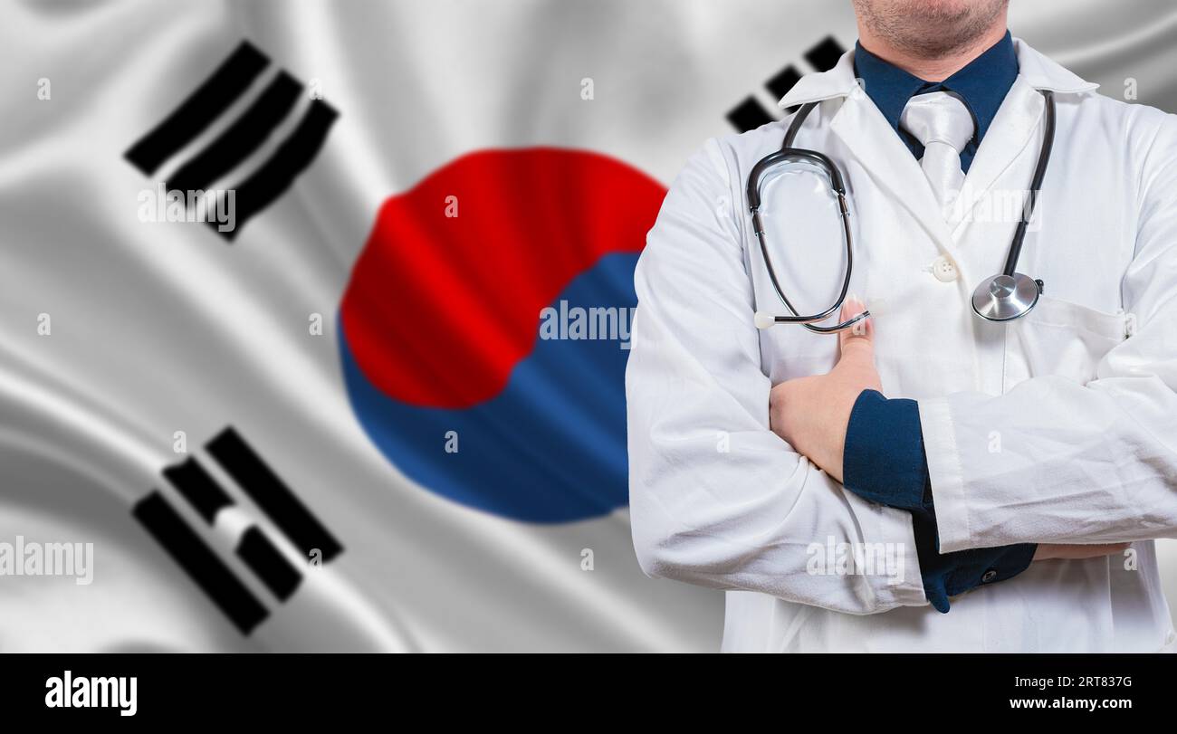 Doctor with crossed arms on South Korean flag. Medical health and care ...