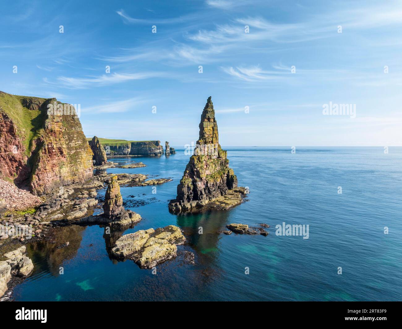 Aerial view of the rugged coastal landscape with the Duncansby Stacks ...