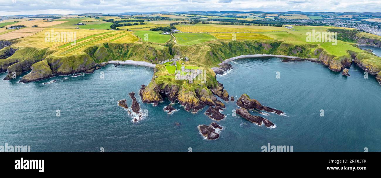 Aerial panorama of Dunnottar Castle ruins on the North Sea coast ...