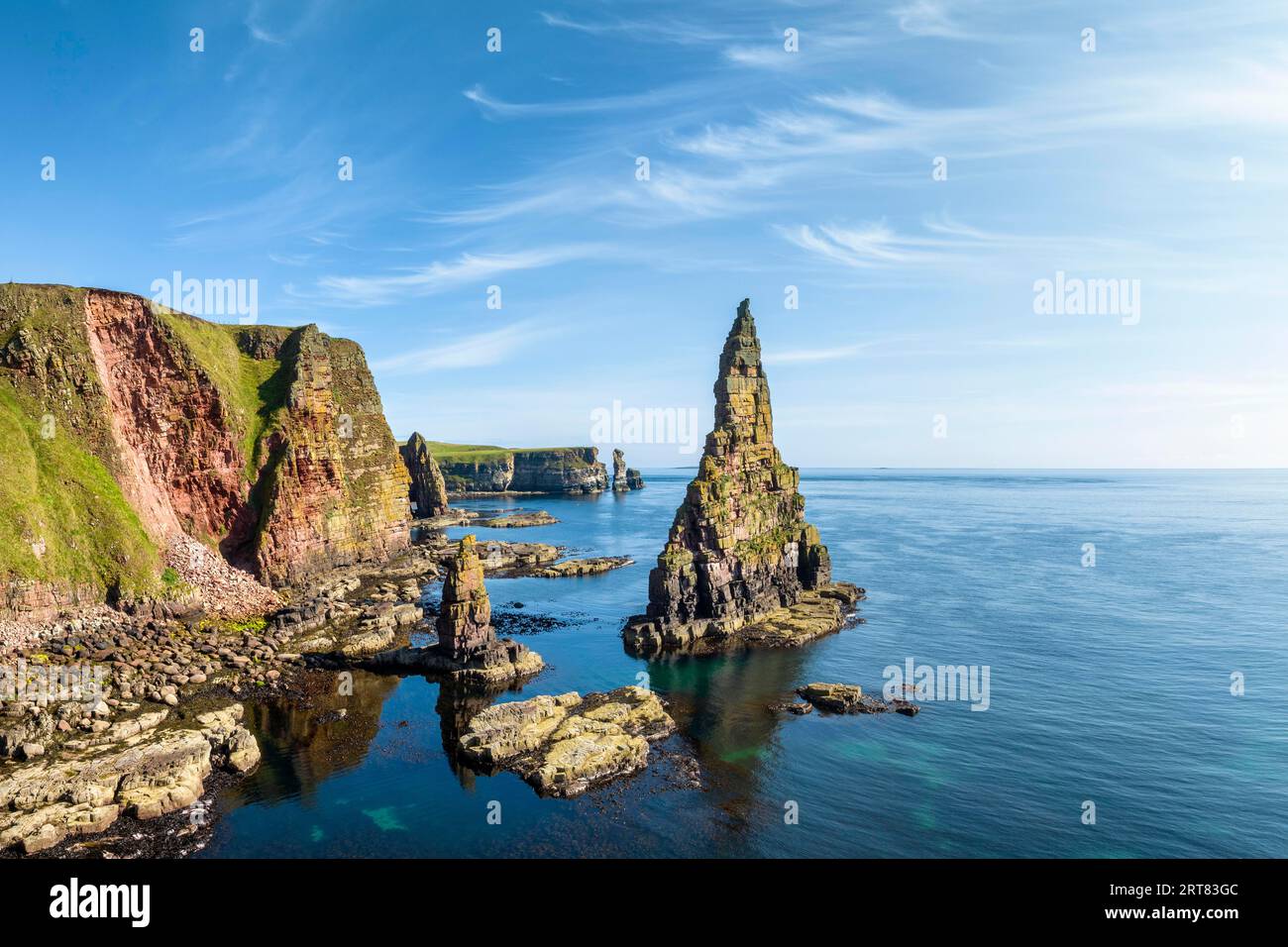 Aerial view of the rugged coastal landscape with the Duncansby Stacks ...