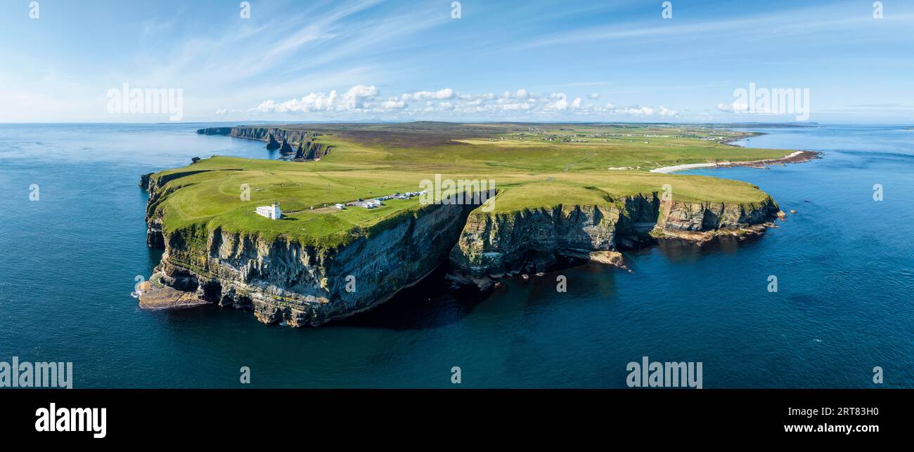 Aerial panorama of the rugged coastal landscape at Duncansby Head with ...