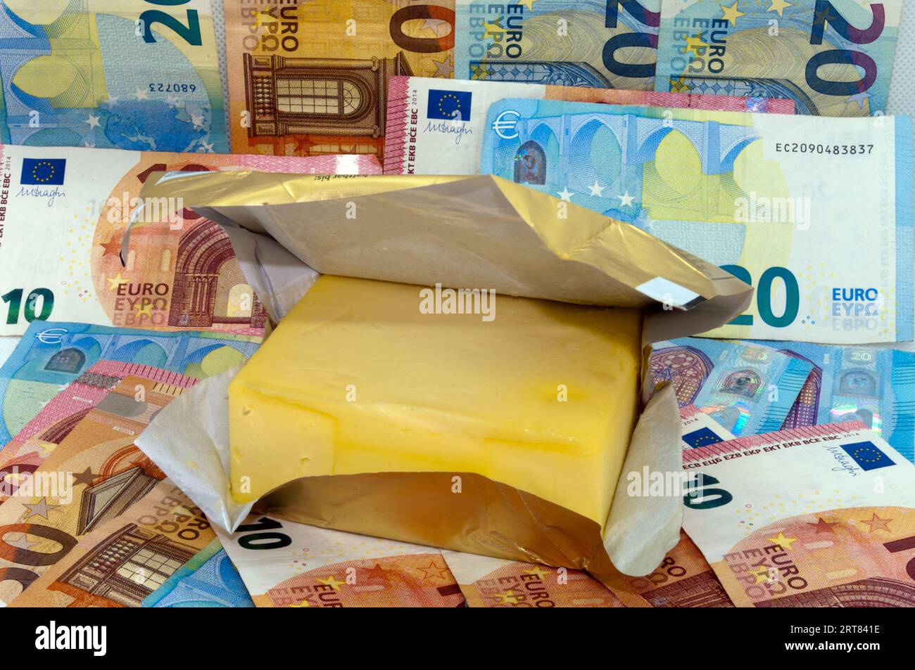 Symbol Image Food Price Increase; A Piece Of Butter In Front Of ...