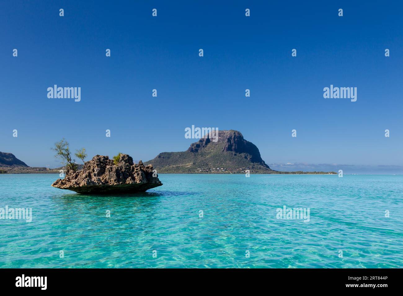 Crystal Rock in the turquoise waters of the lagoon at Le Morne ...