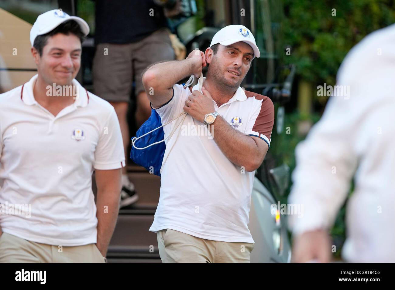 Ryder Cup team Europe vice captain Francesco Molinari, center, returns with his team to a hotel ...