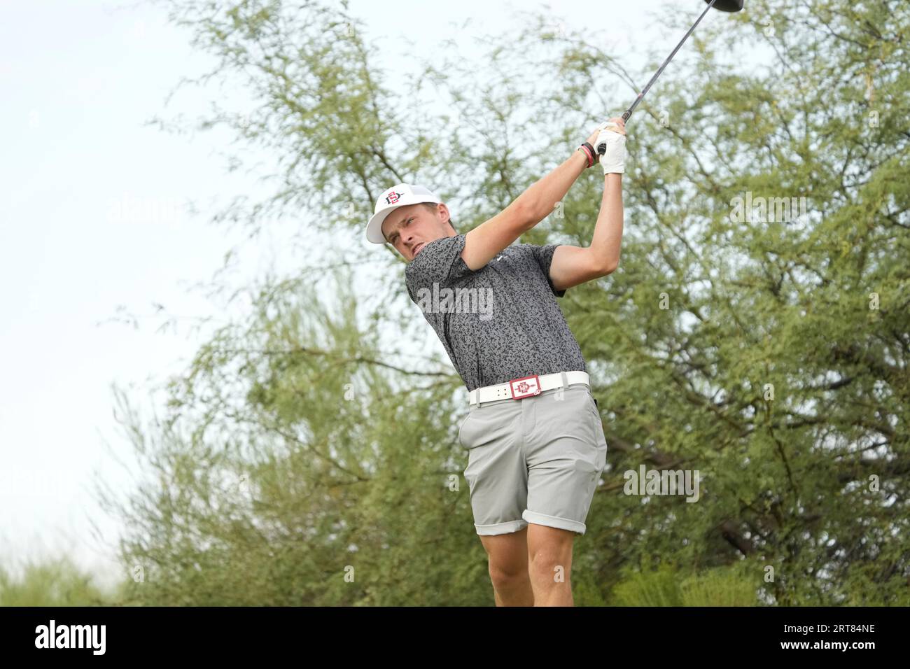 San Diego State golfer Justin Hastings hits on the fifth hole during an ...