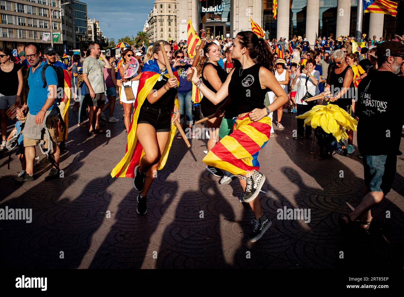 September 11, 2023, Barcelona, Spain: Women wrapped in estelada flags ...