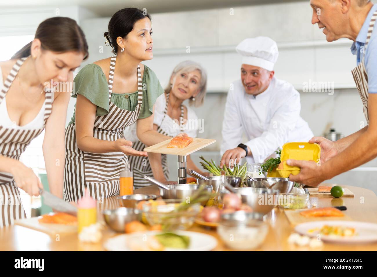 Professional personal chef cook in customer private kitchen house ...