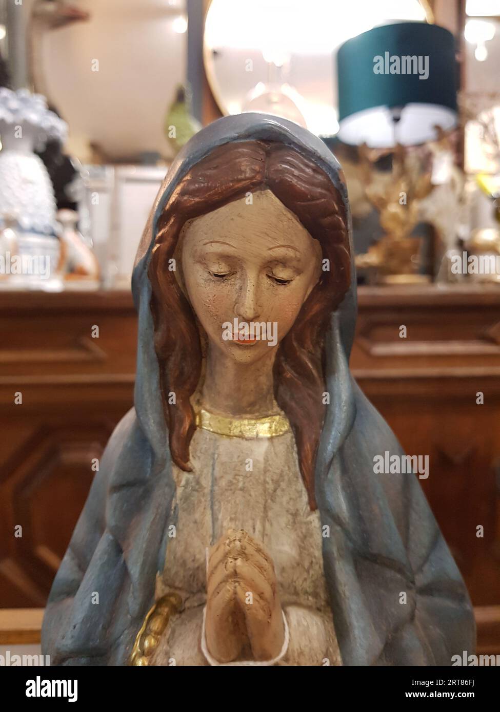 A detail from a religious statue Stock Photo - Alamy
