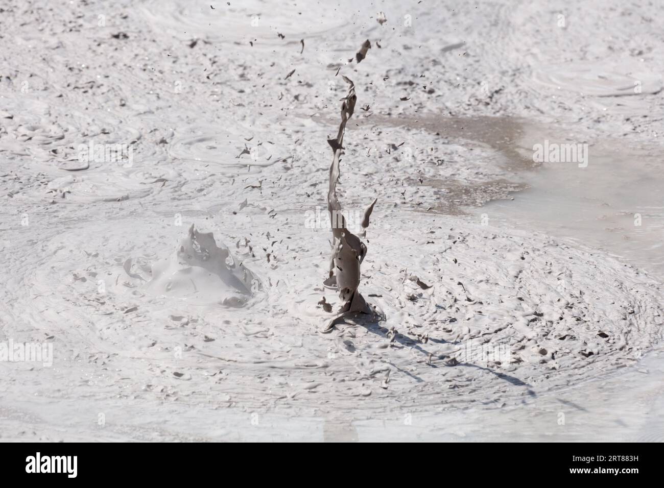 An exploding hot mud pool in Wai-O-Tapu Thermal Wonderland near Rotorua ...