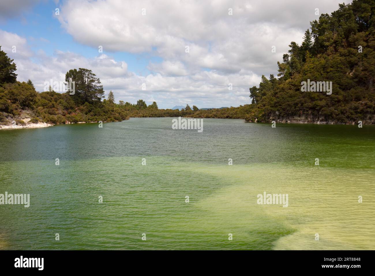 Lake Ngakoro and waterfall at Wai-O-Tapu Geothermal Wonderland near ...