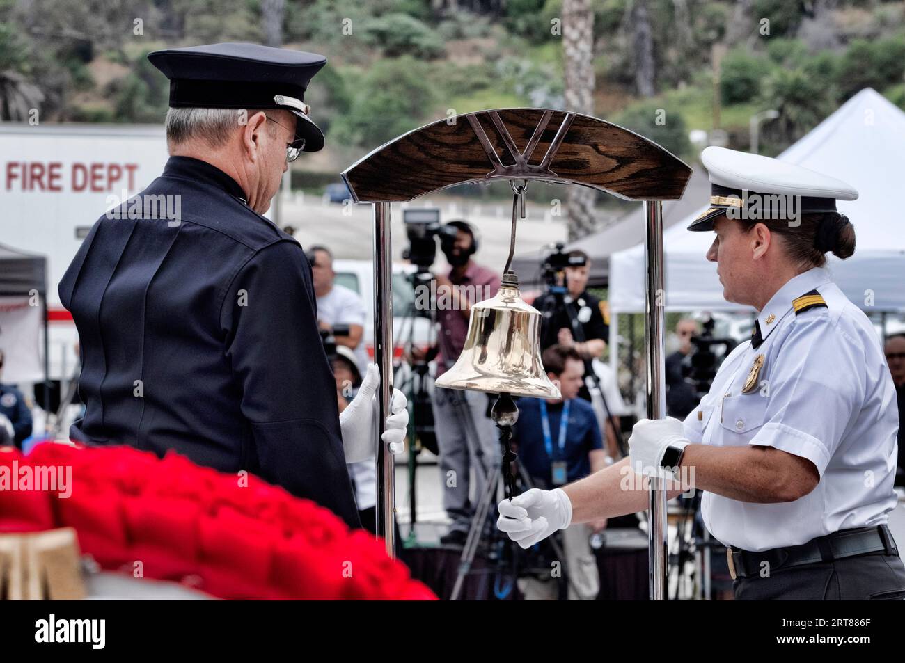 Los Angeles Fire Chief Kristin M. Crowley, right, is joined by Los ...