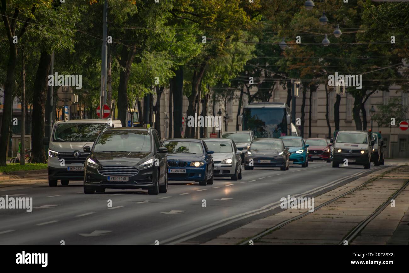 Traffic in empty fresh streets of capital in morning in Wien in Austria ...