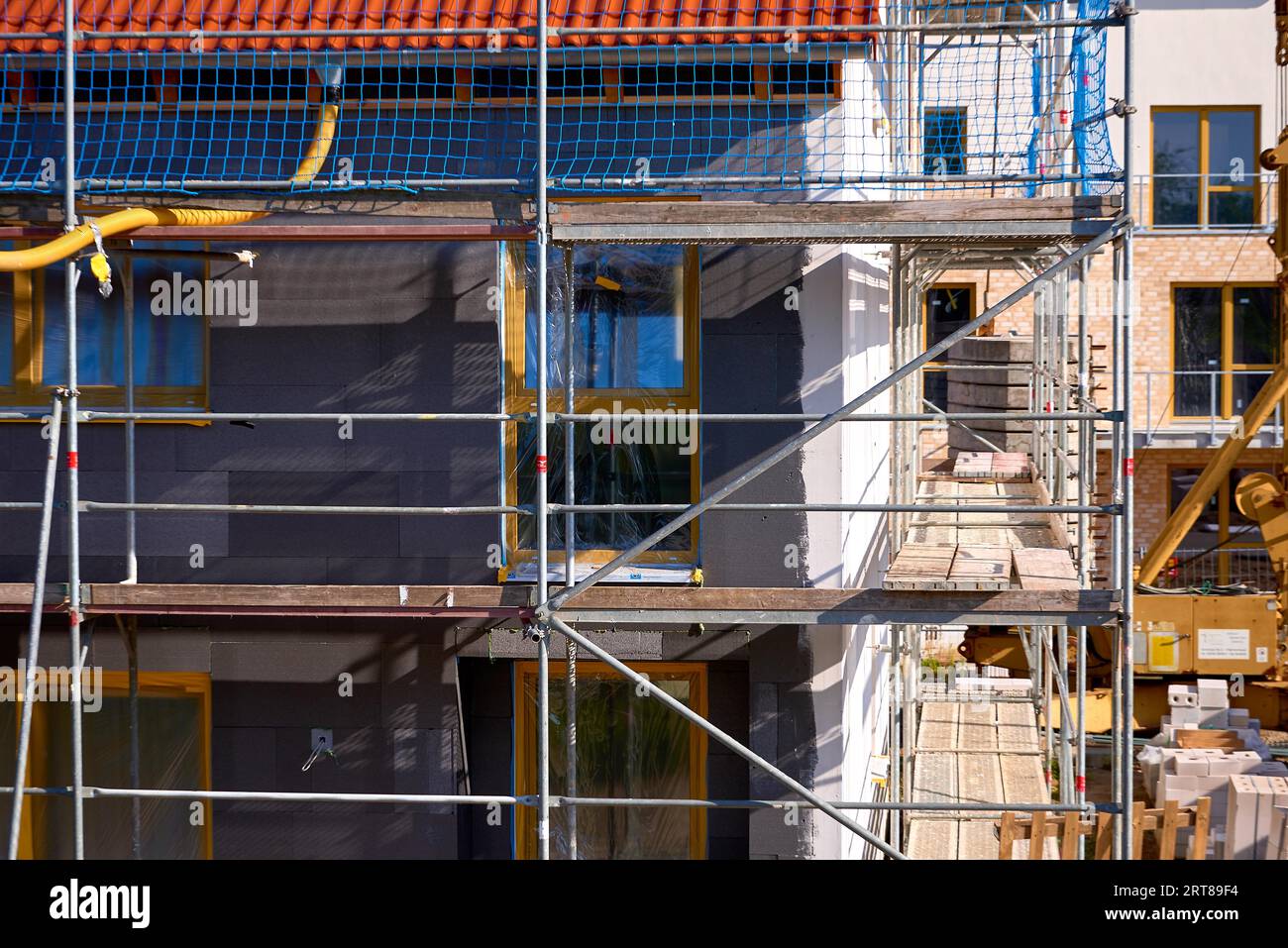 Invest in house building Stock Photo - Alamy