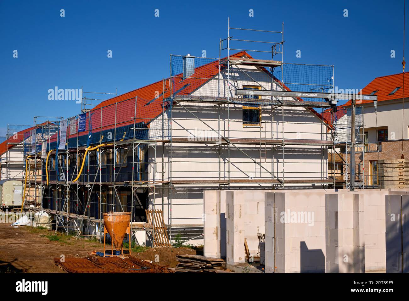 Invest in house building Stock Photo - Alamy
