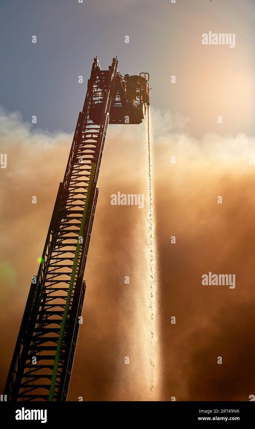 Firefighter at work Stock Photo - Alamy