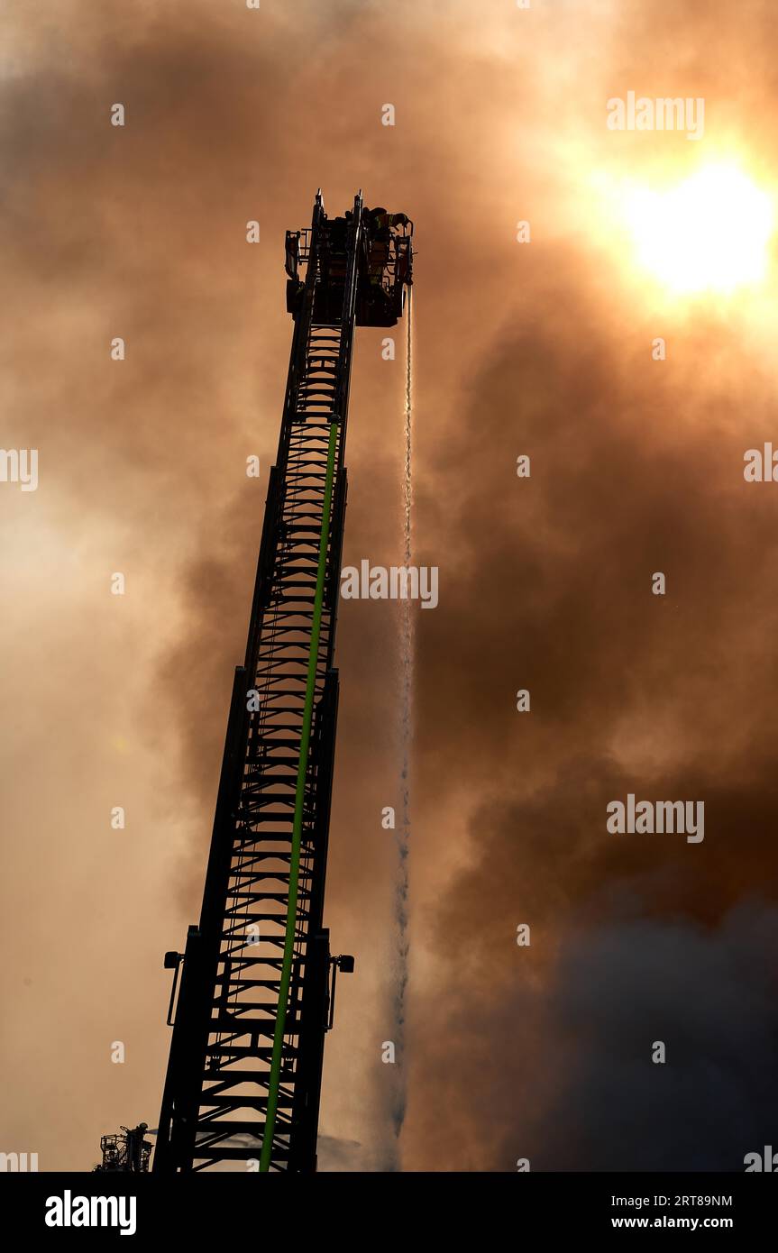 Firefighter at work Stock Photo - Alamy