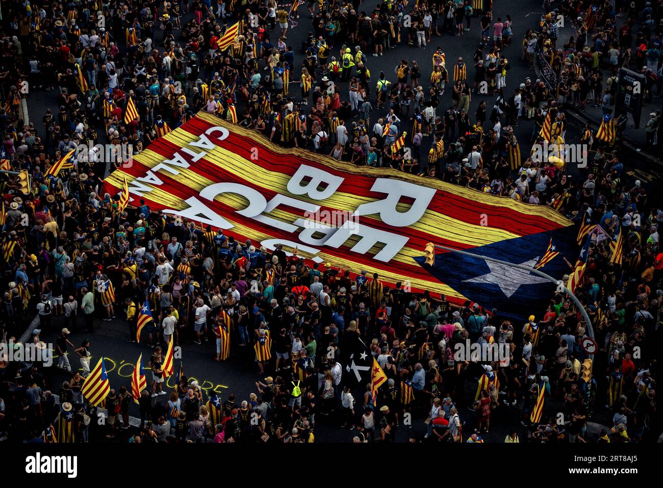 Barcelona, Spain. 11th Sep, 2023. Pro-independence activist carry a ...
