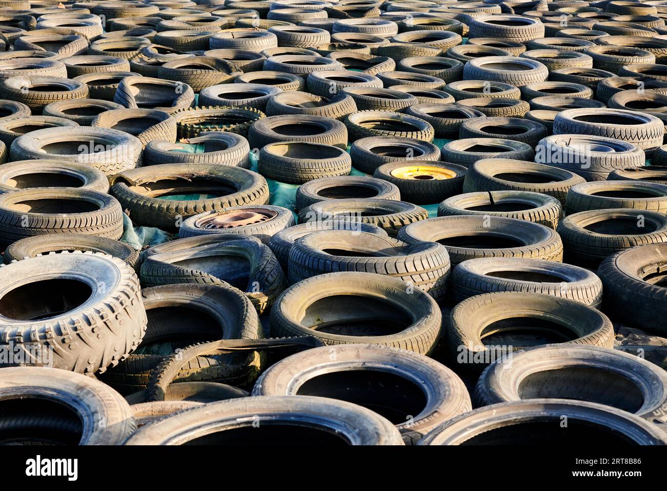 Tons of old used tyres in a mix Stock Photo - Alamy Tons of old used tyres in a mix Stock Photo - Alamy