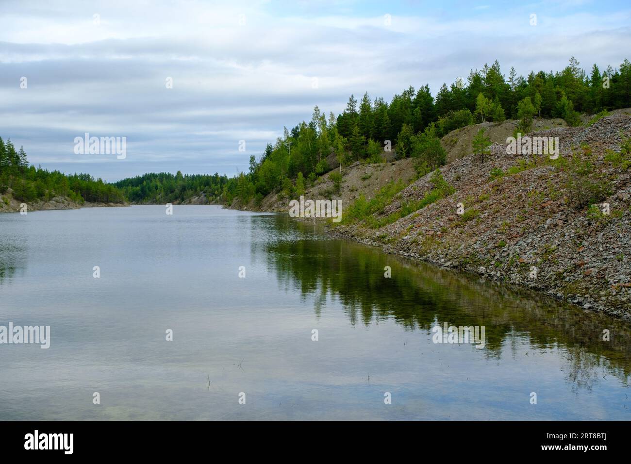 This is a former shale quarry with azure water and picturesque hills ...