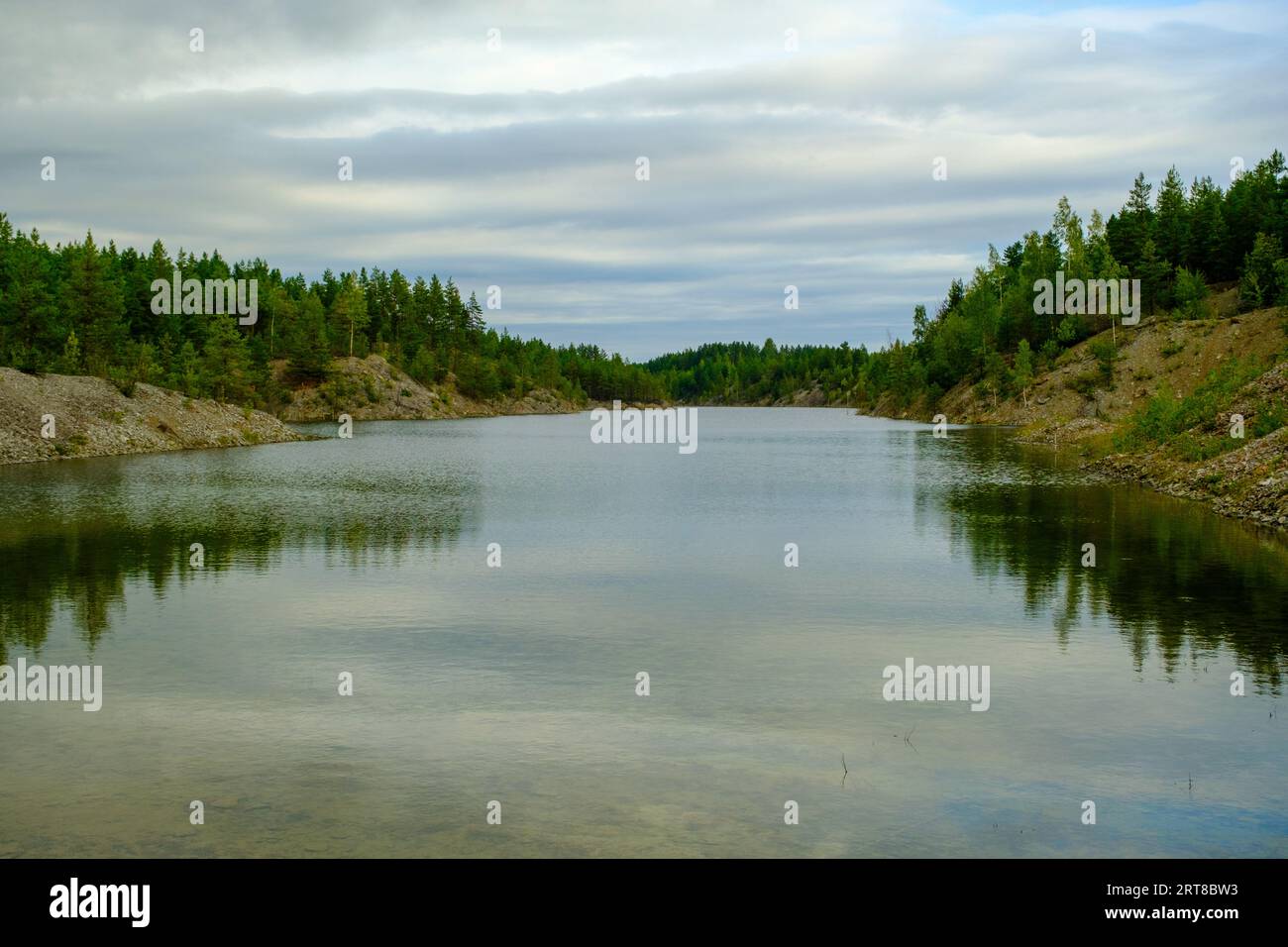 This is a former shale quarry with azure water and picturesque hills ...