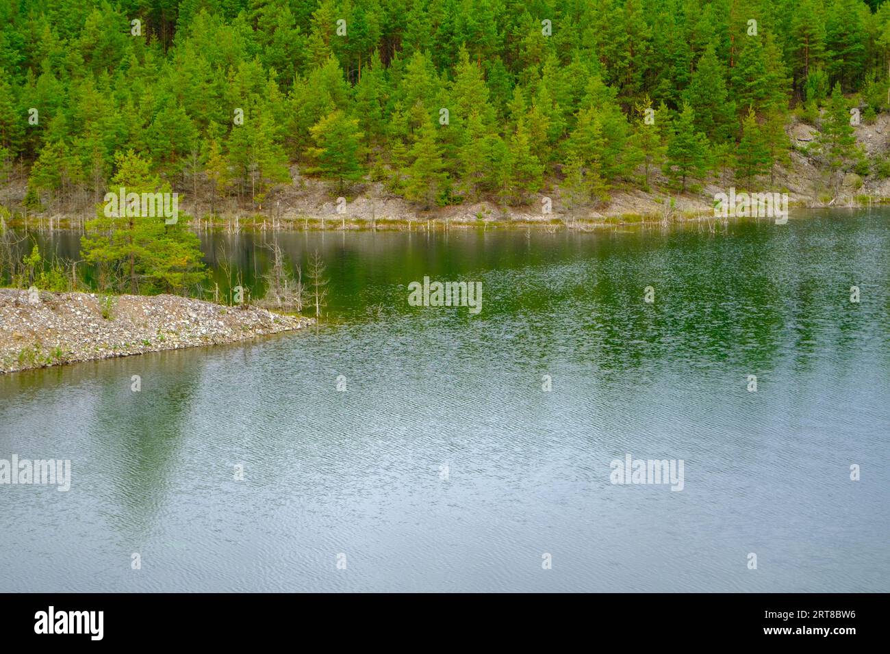 This is a former shale quarry with azure water and picturesque hills ...