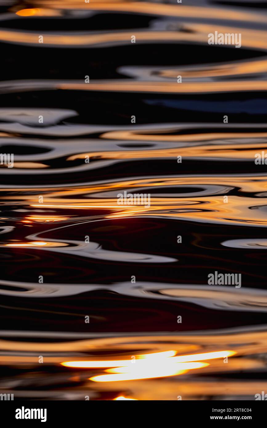 Sun ray relection on water surface Stock Photo - Alamy