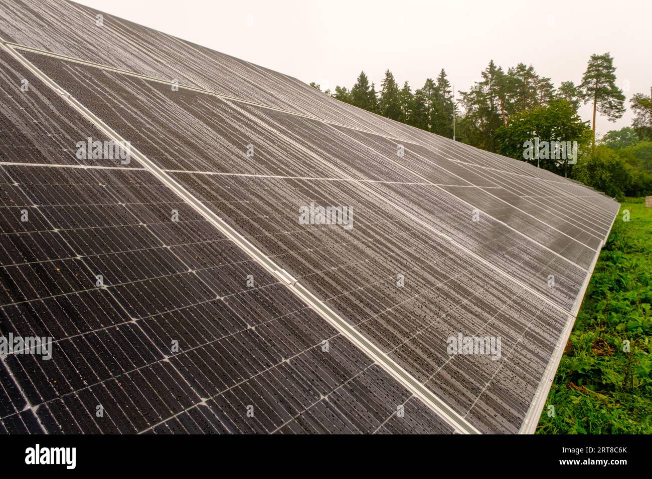 Solar panel with raindrops on nano coating. Renewable energy from the ...