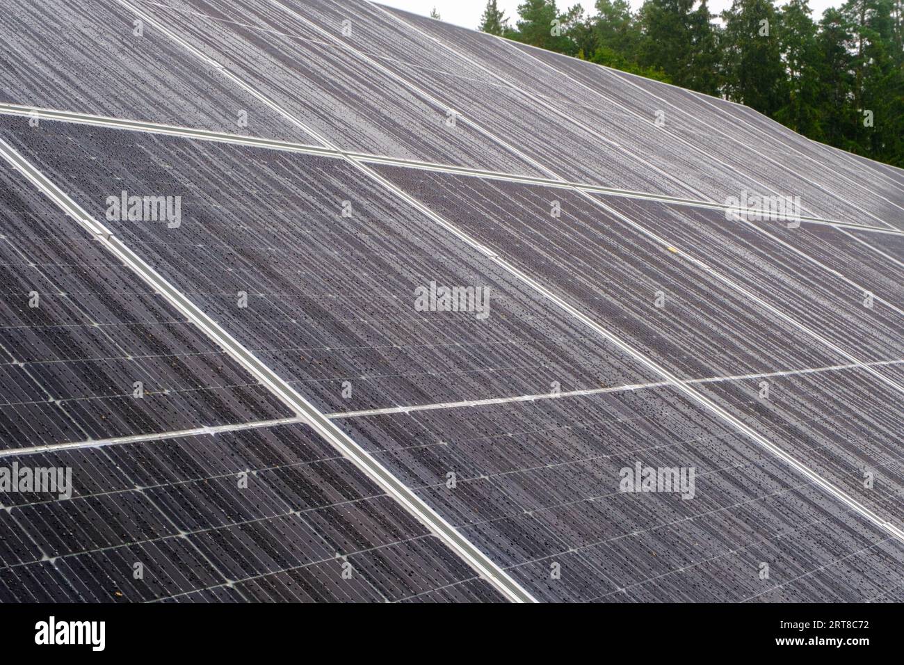 Solar panel with raindrops on nano coating. Renewable energy from the ...