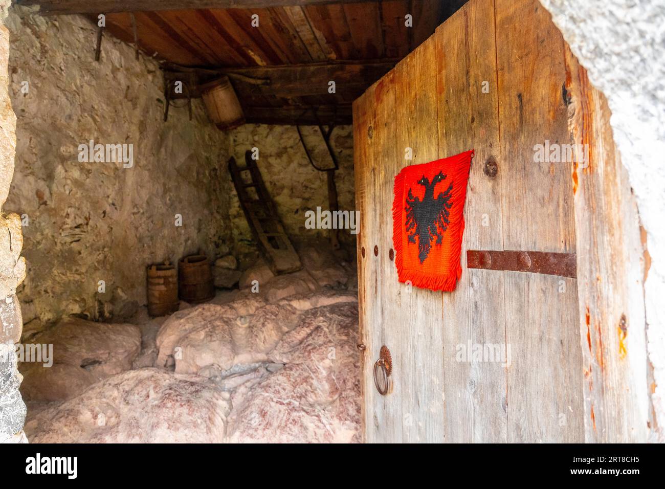 Entrance gate to Nikoll Koceku tower in the valley of Theth national ...