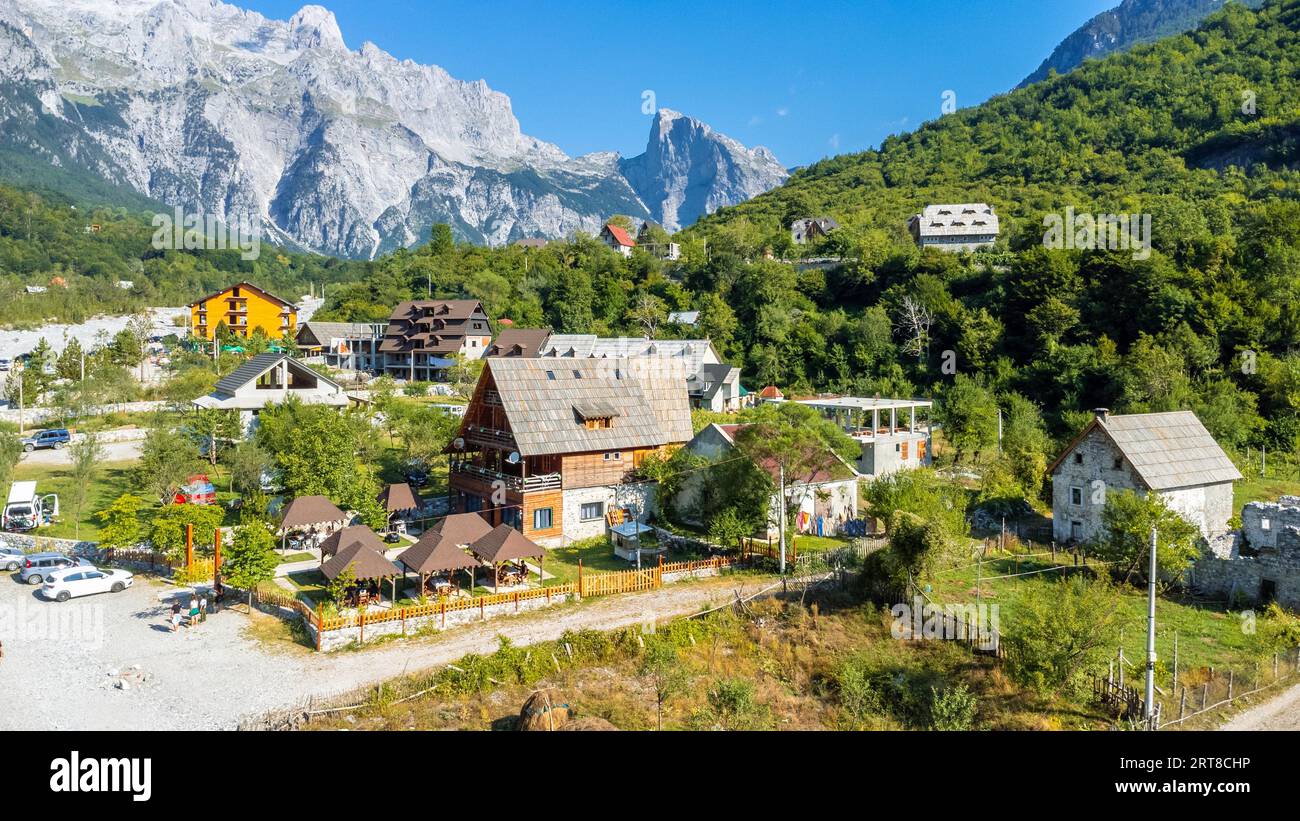 Aerial drone view of the rustic homes in Theth National Park, Albania ...