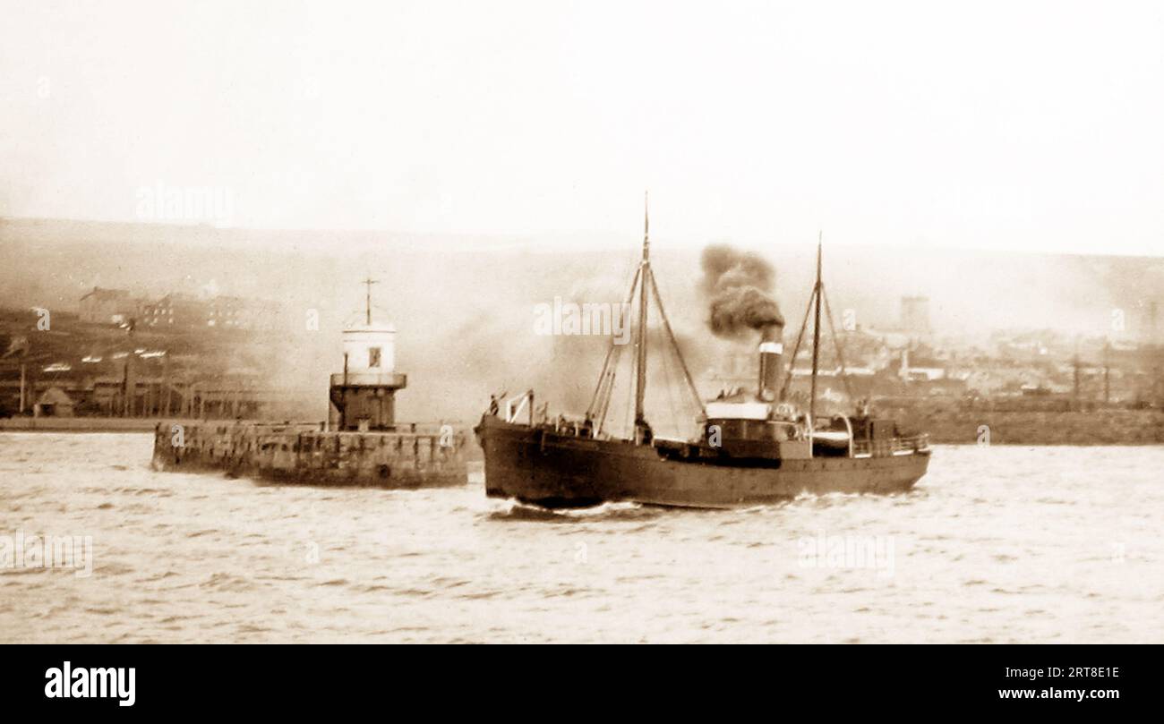 SS Minnie Hinde cargo ship leaving Whitehaven, early 1900s Stock Photo ...