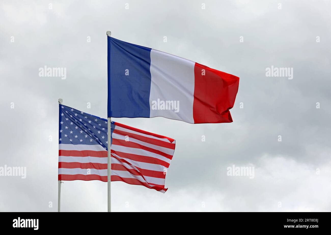 flags of France and USA waving together symbol of Cooperation and ...