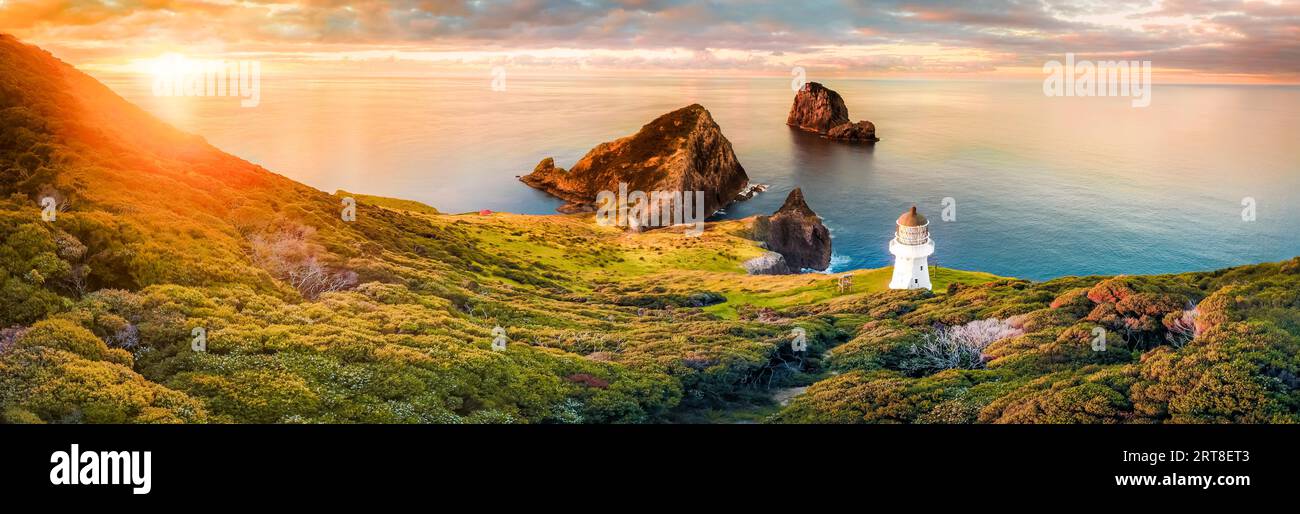 Scenic panorama of Cape Brett lighthouse on the coast of New Zealand ...