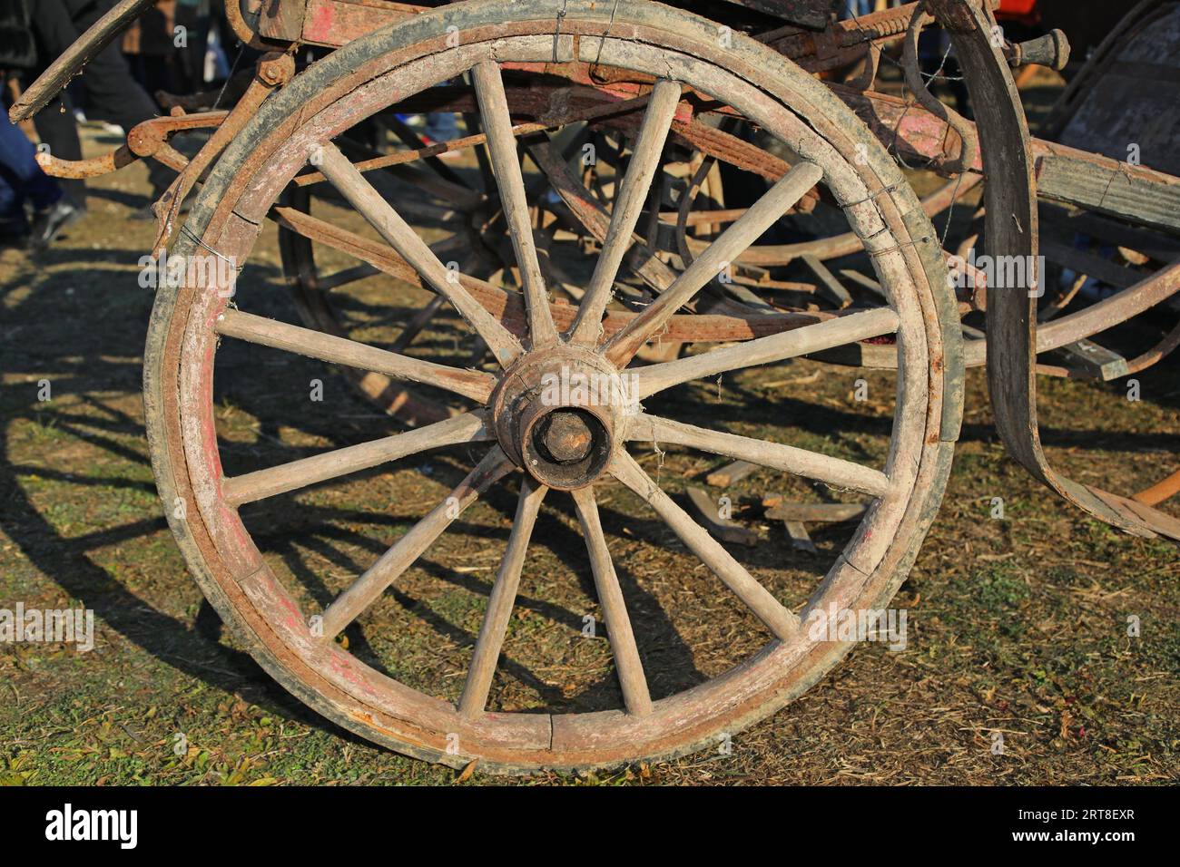 very old wooden wheel of a wagon for transport with spokes Stock Photo ...