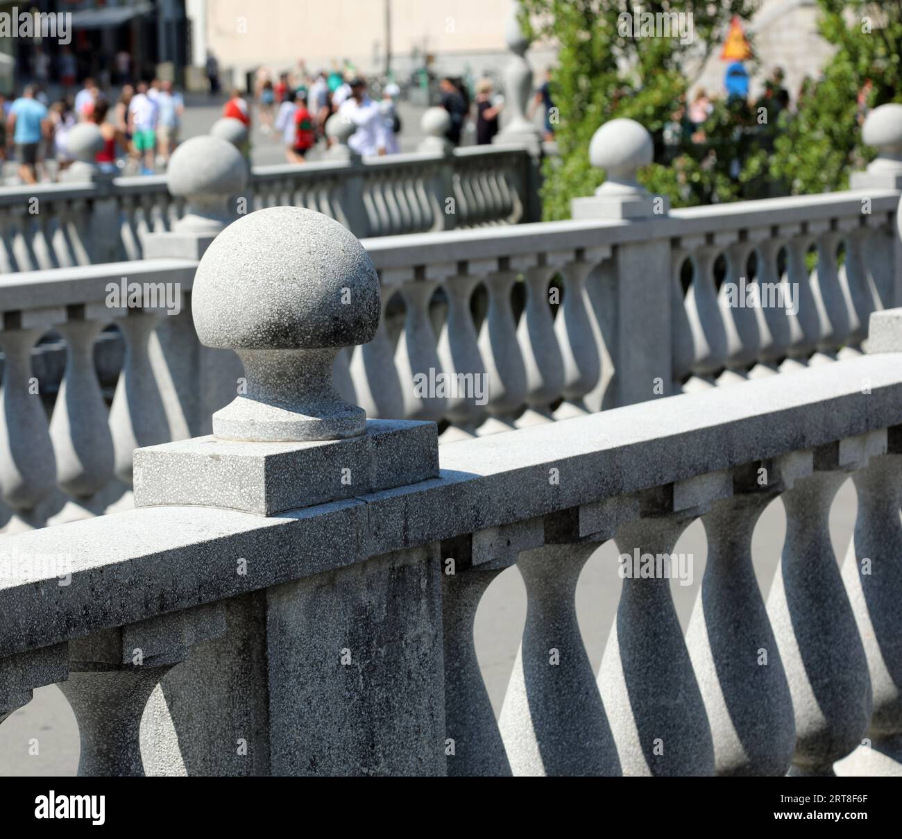 balustrades of the famous bridge of the city of Ljubljana in Slovenia ...